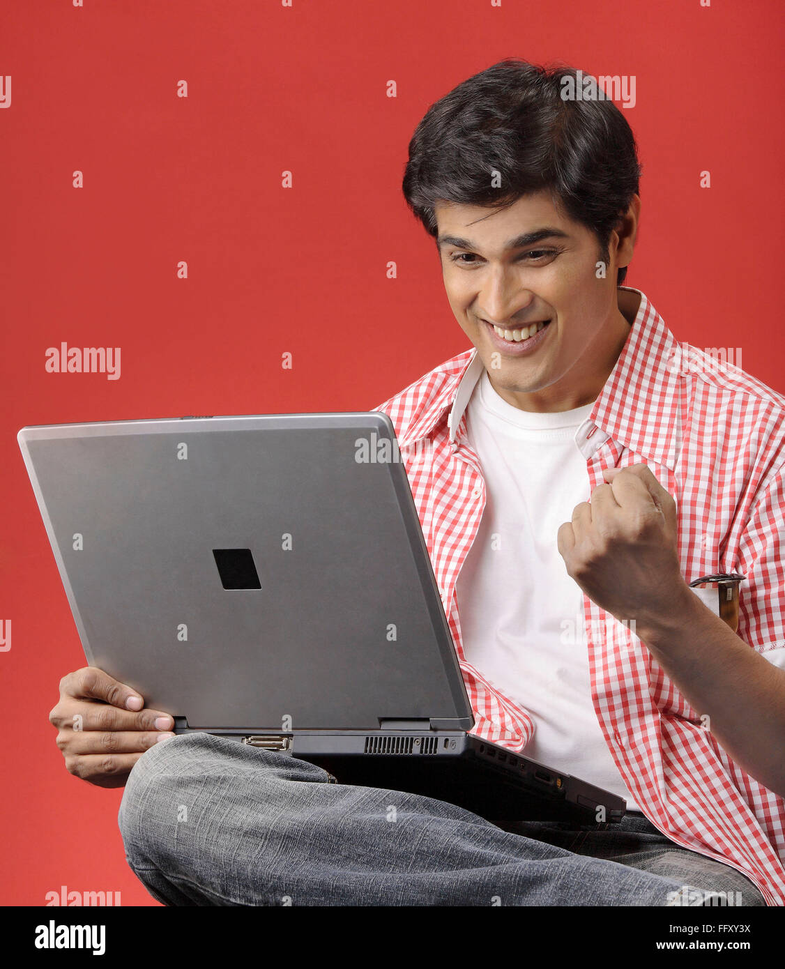 South Asian Indian man using laptop , India MR#732A Stock Photo - Alamy