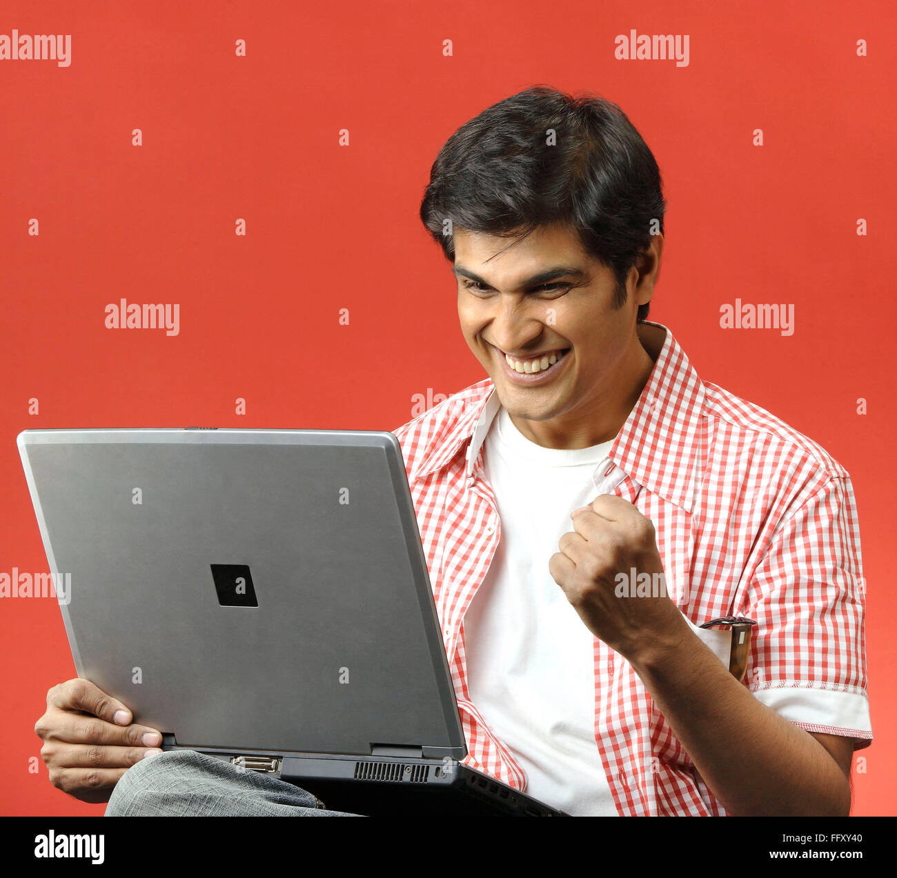 South Asian Indian man using laptop , India MR#732A Stock Photo - Alamy