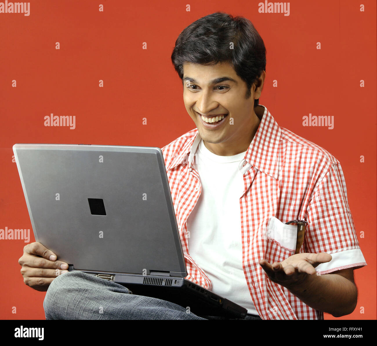 South Asian Indian man using laptop , India MR#732A Stock Photo - Alamy