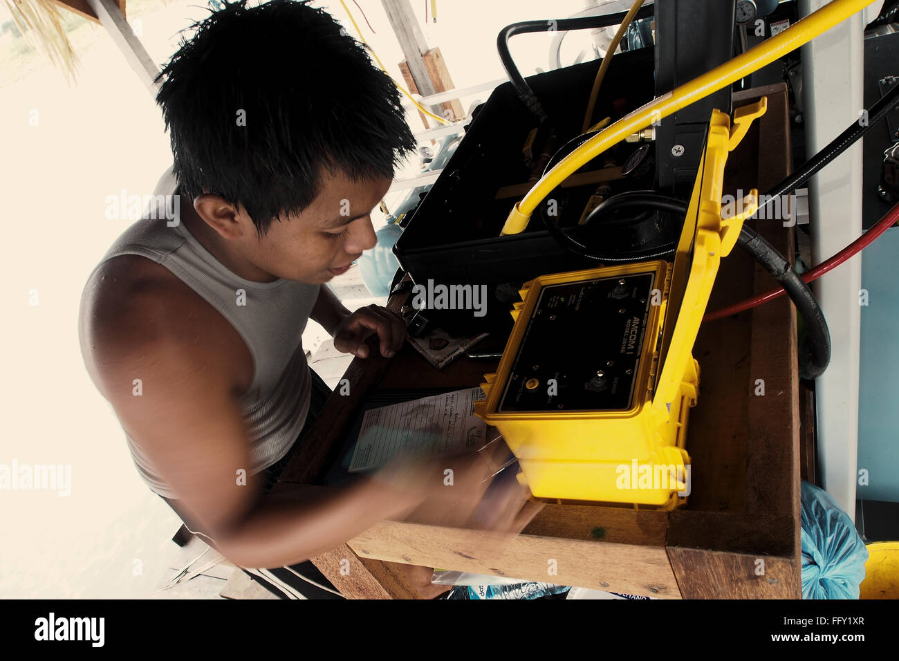 Underwater logging Communication between divers, one on the barge and ...