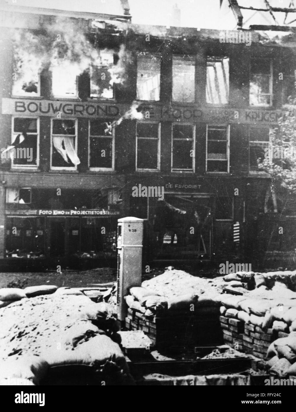 WORLD WAR II: ROTTERDAM. /nBurning buildings and street trenches in ...