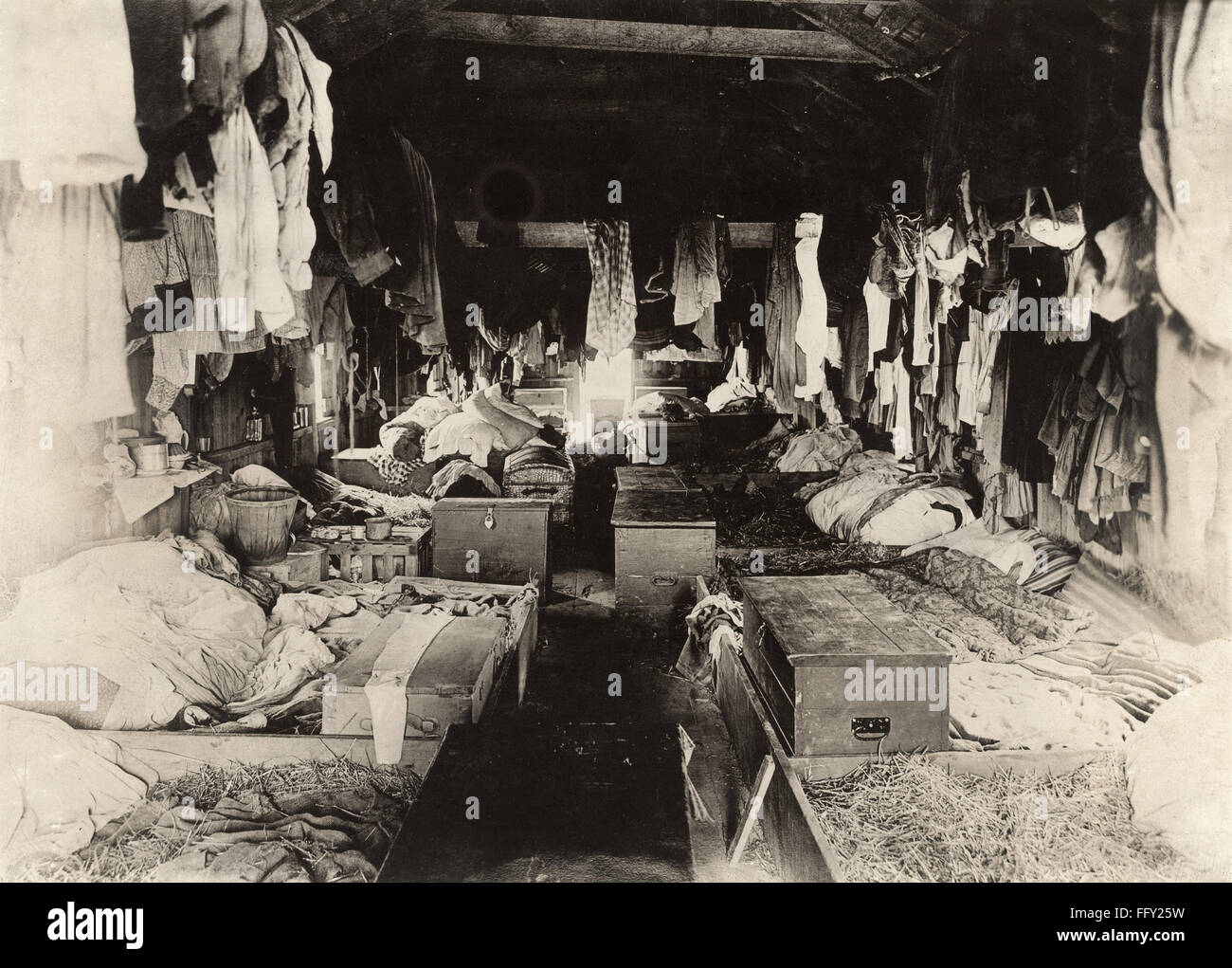 BERRY PICKER SHACKS, c1909. /nInterior of a crowded shack occupied by ...