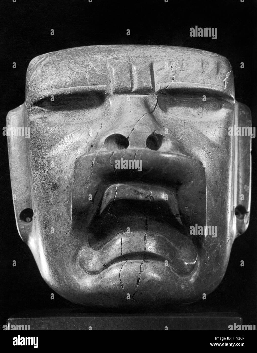 OLMEC HEAD. /nA stone sculpture from the Gulf Coast of Mexico, made by ...