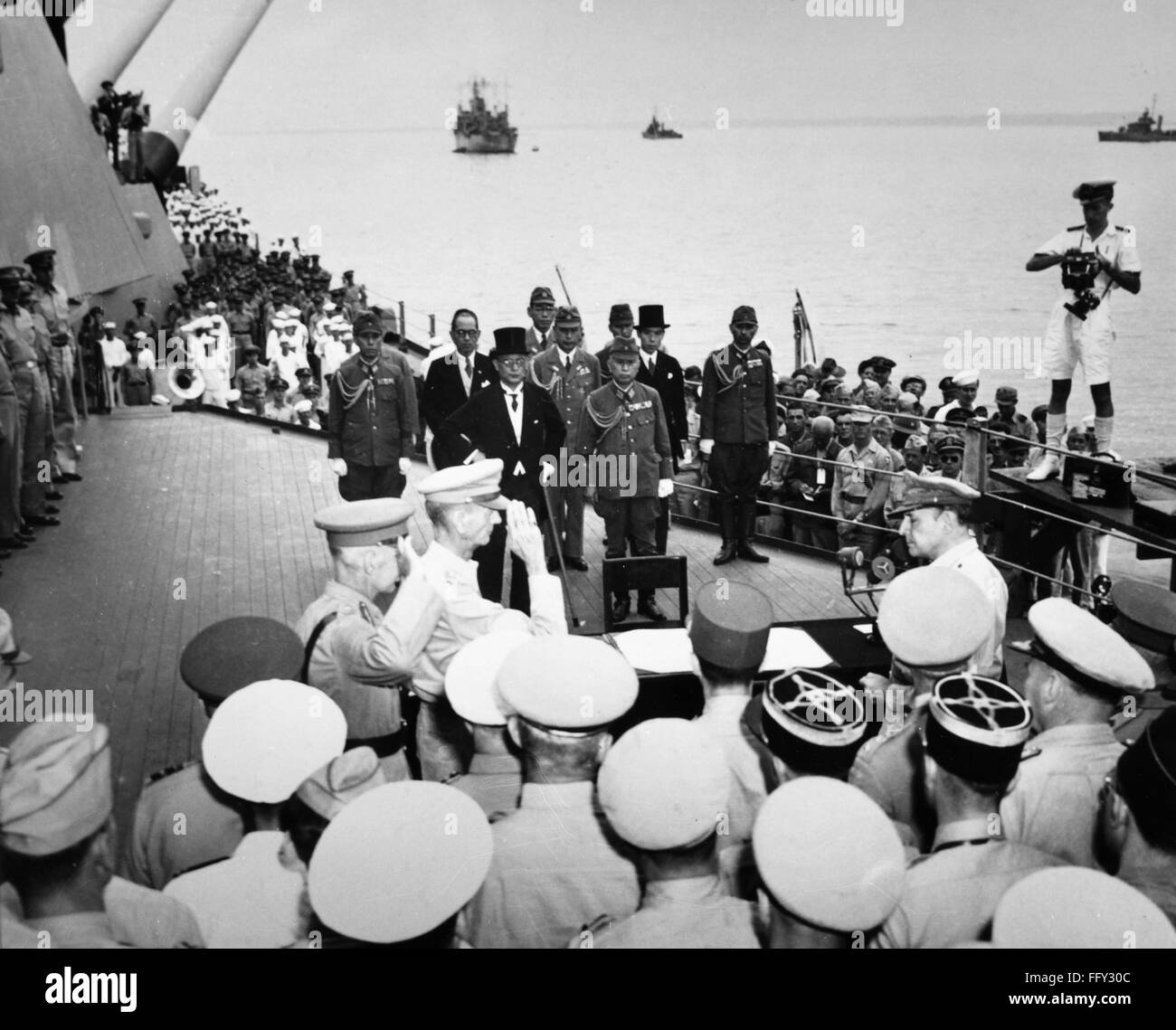 SURRENDER OF JAPAN, 1945. /nGeneral Douglas MacArthur (at table, right ...