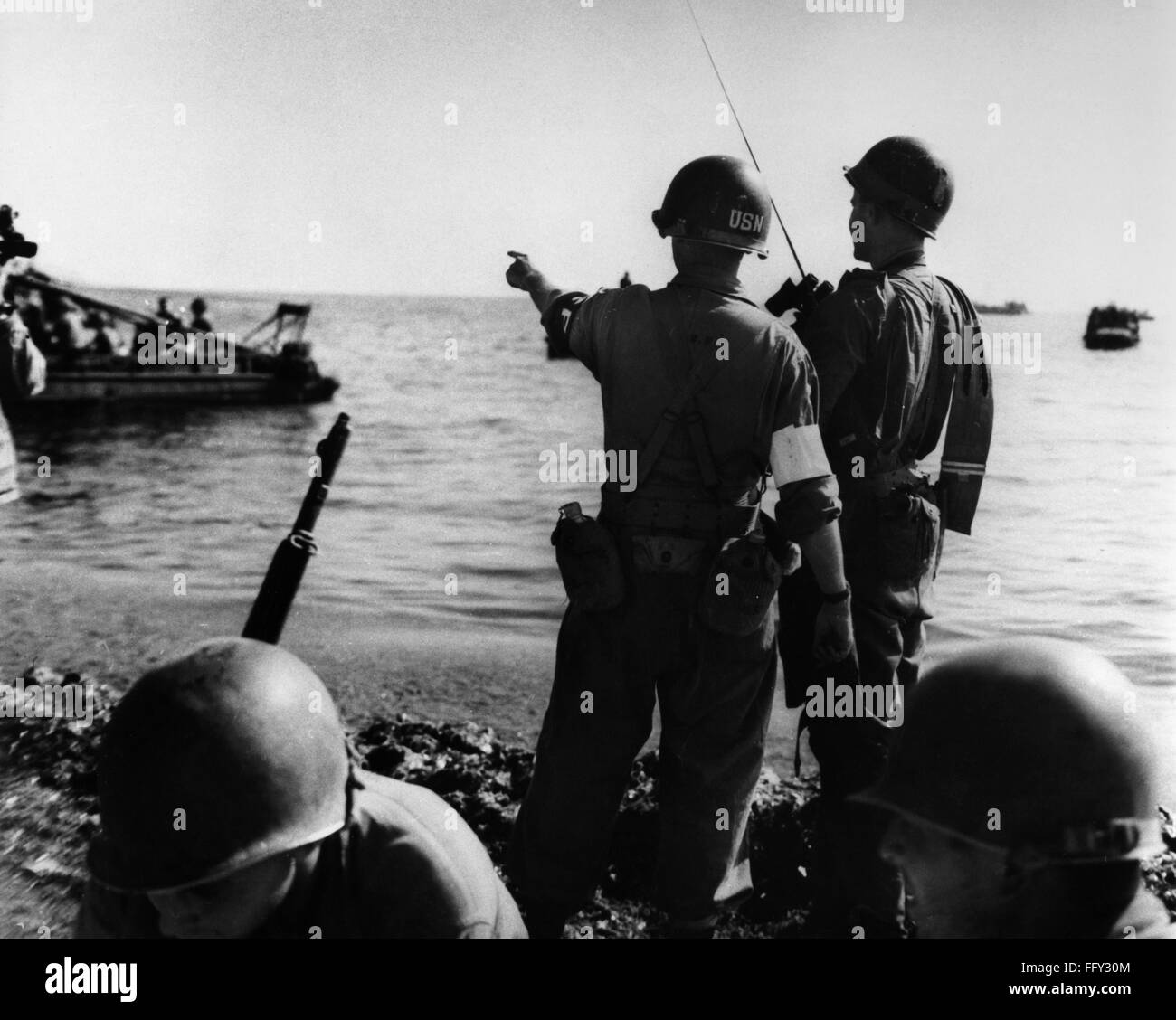 WORLD WAR II: FRANCE, 1944. /nA U.S. Navy Beachmaster instructs an army ...
