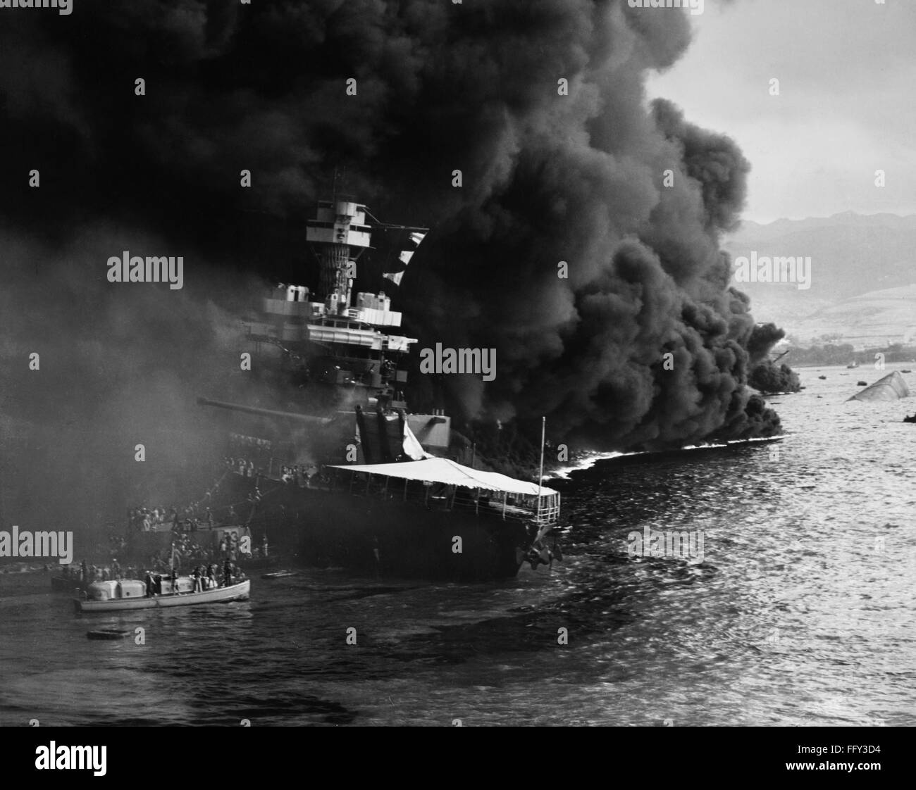 WORLD WAR II: PEARL HARBOR. /nThe USS California settles in the mud ...