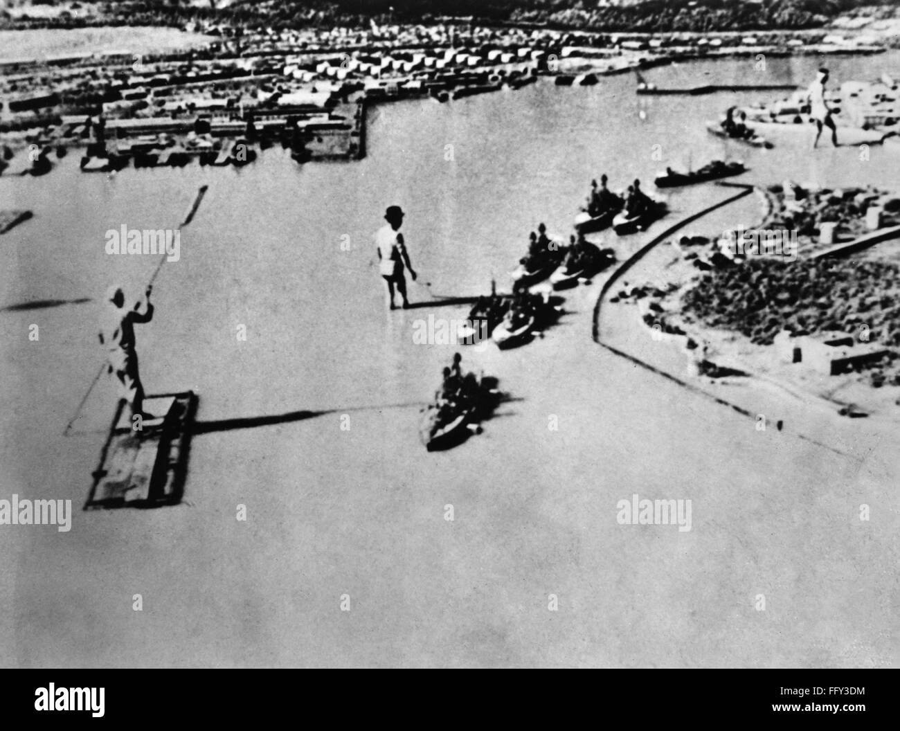 WORLD WAR II: PEARL HARBOR. /nJapanese men creating a model of Ford ...