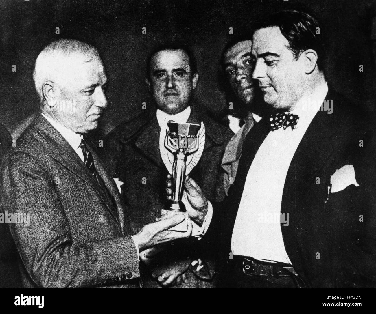 WORLD CUP: TROPHY, 1930. /nJules Rimet (left), president of FIFA ...