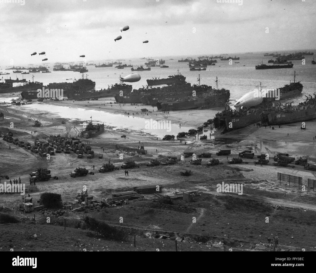 WORLD WAR II: NORMANDY. /nLarge landing crafts carrying supplies and ...