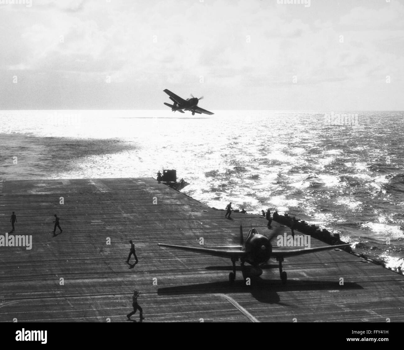WWII: AIRCRAFT CARRIER. /nF6F Hellcats returning returning to a U.S ...