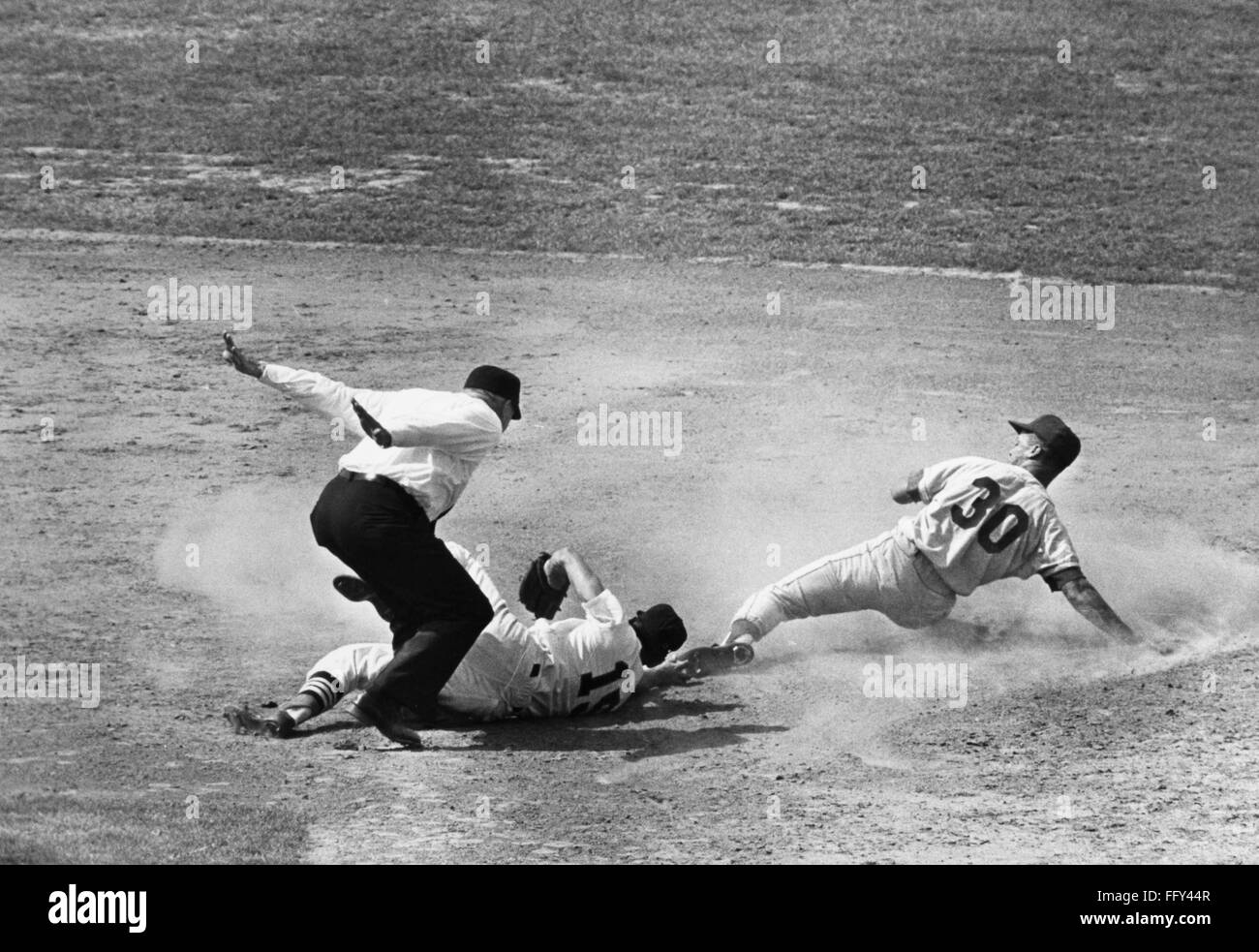 MAURY WILLS (1932- ). /nAmerican baseball player. Sliding safely into ...