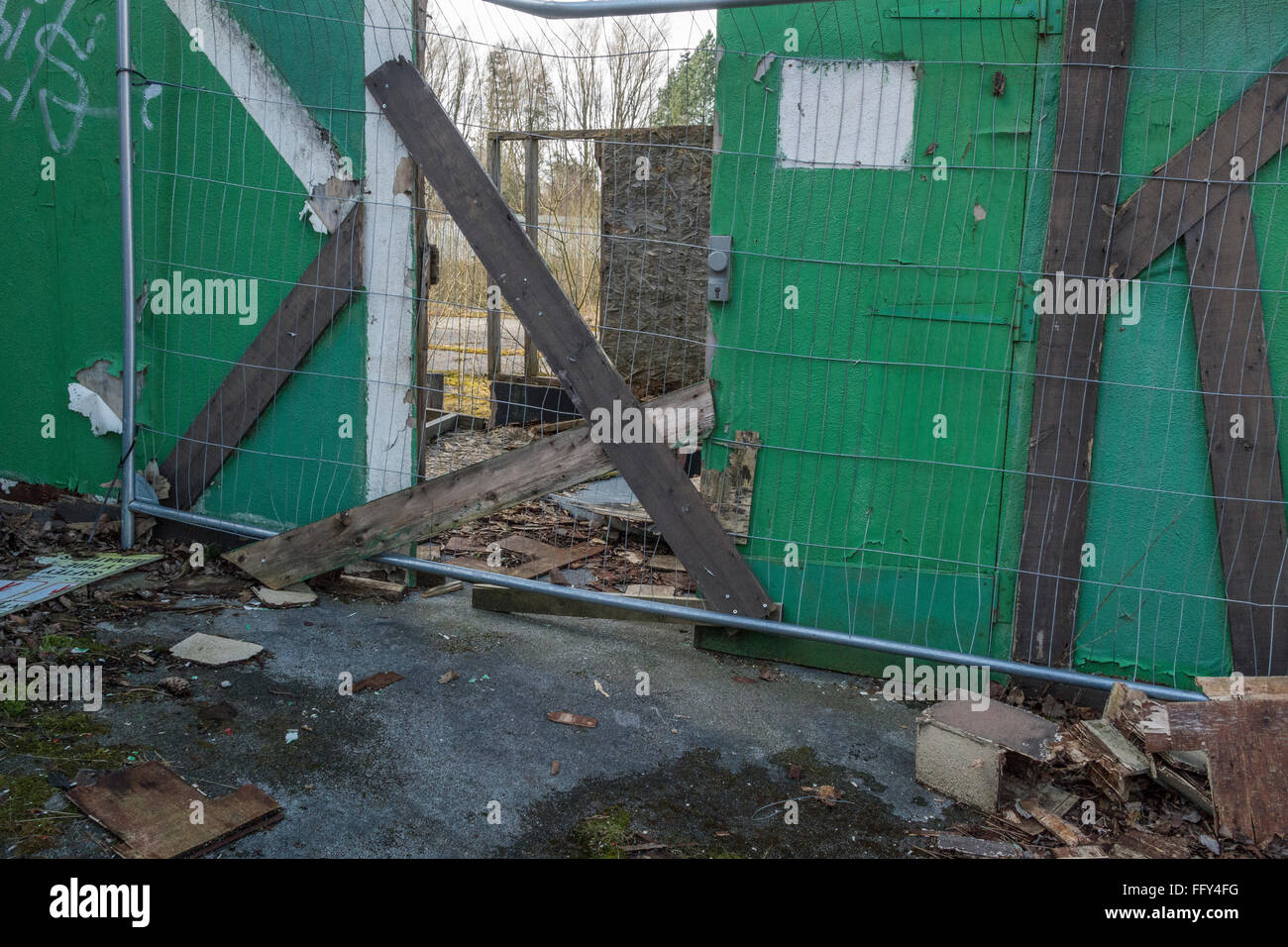 Boarded up entrance to a vandalised theme park Stock Photo - Alamy