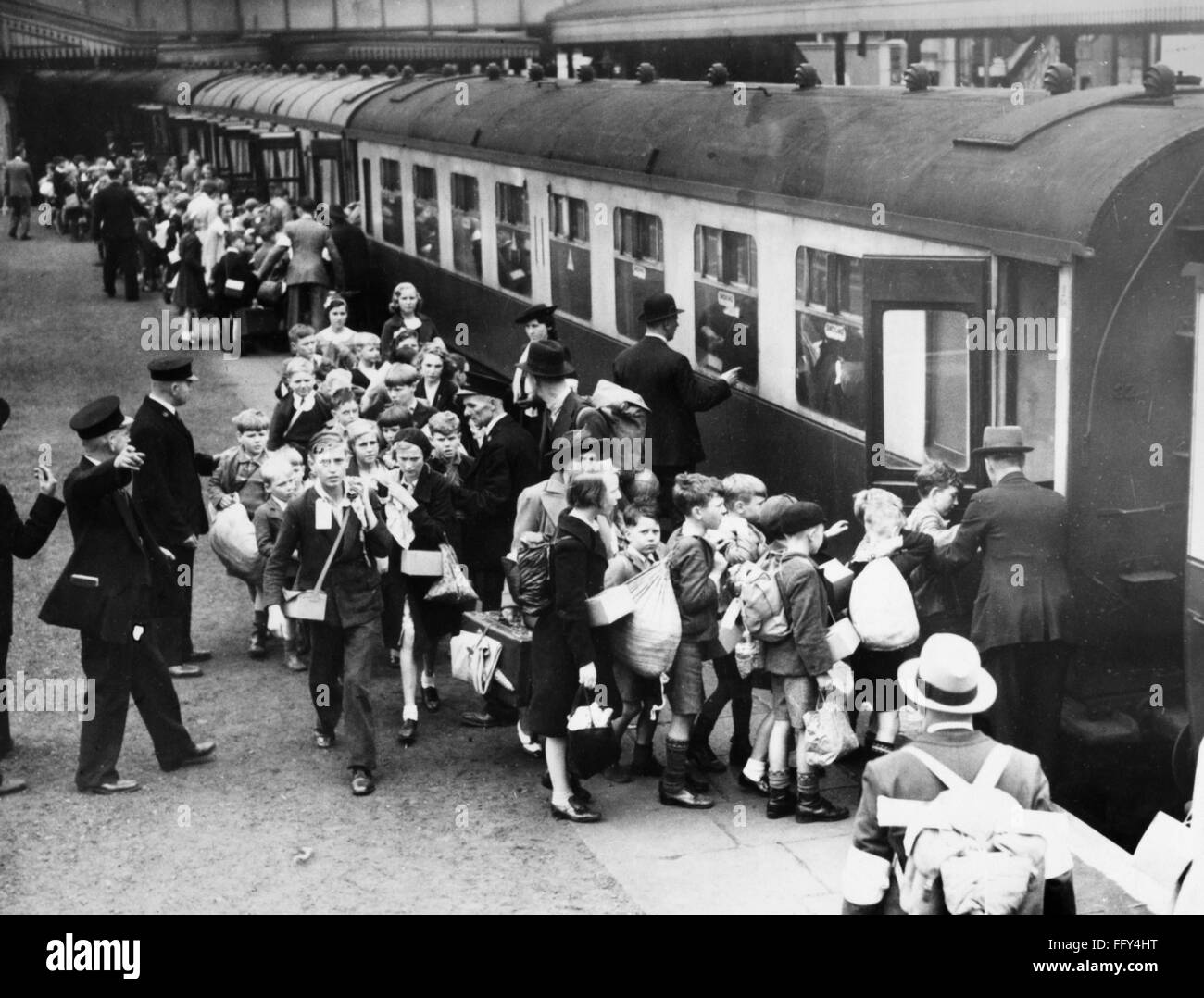 WORLD WAR II: EVACUEES. /nSchoolchildren boarding evacuation trains at ...