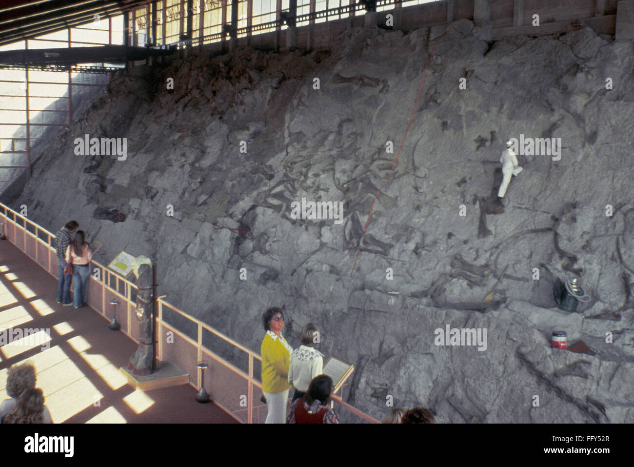 UTAH: DINOSAUR QUARRY. /nVisitors viewing the cliff face, containing ...