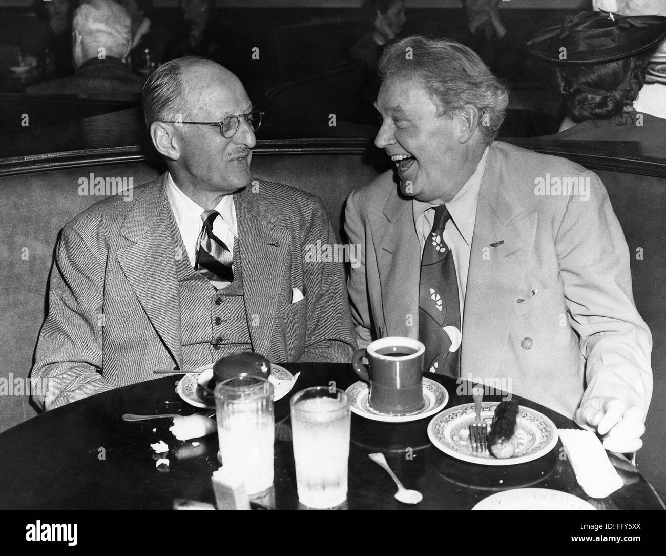 CASE & FARNUM, 1944. /nAmerican hotel owner Frank Case eating lunch ...