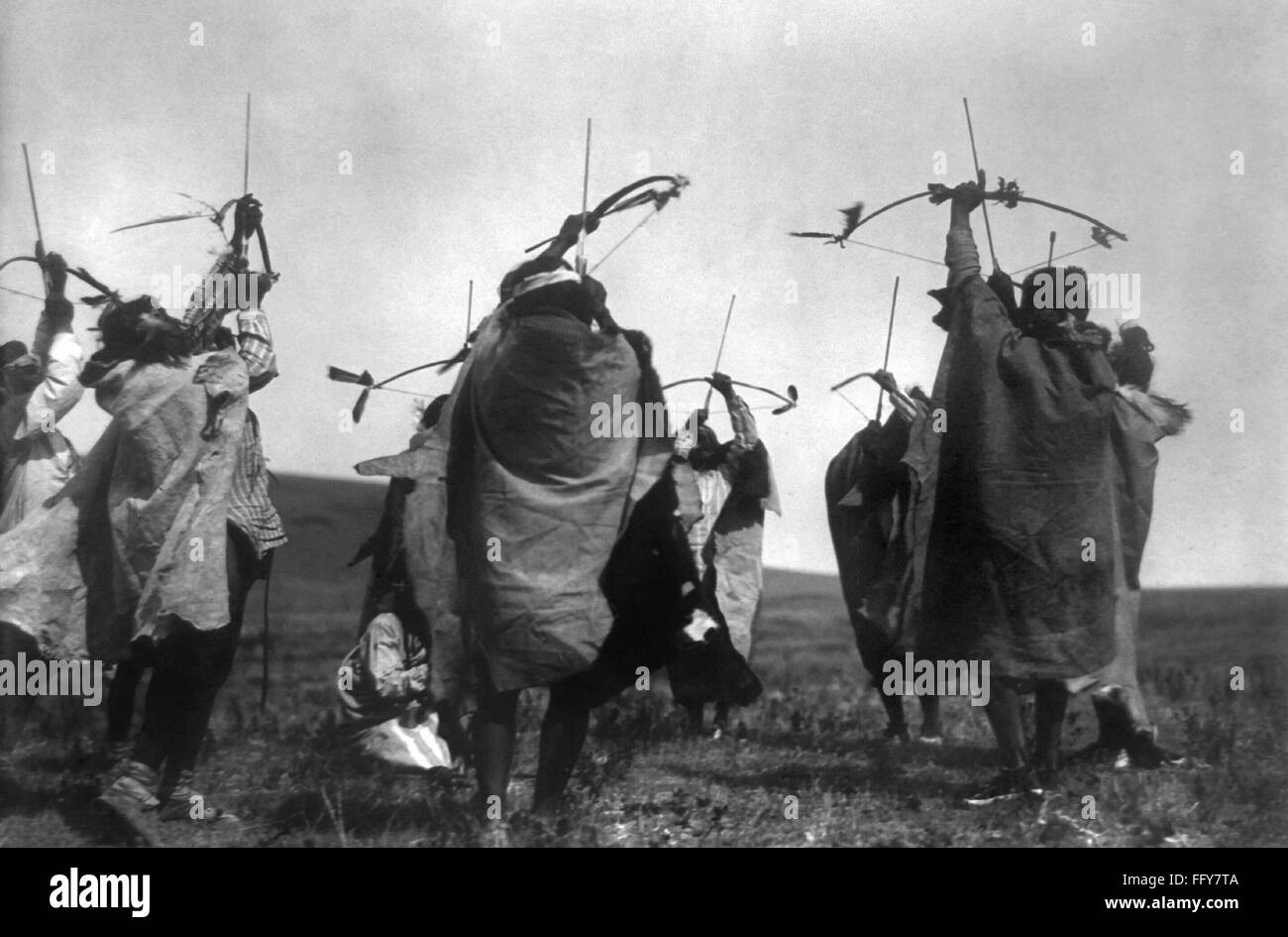 ATSINA RITUAL, c1908. /nAtsina Native Americans shooting arrows toward ...