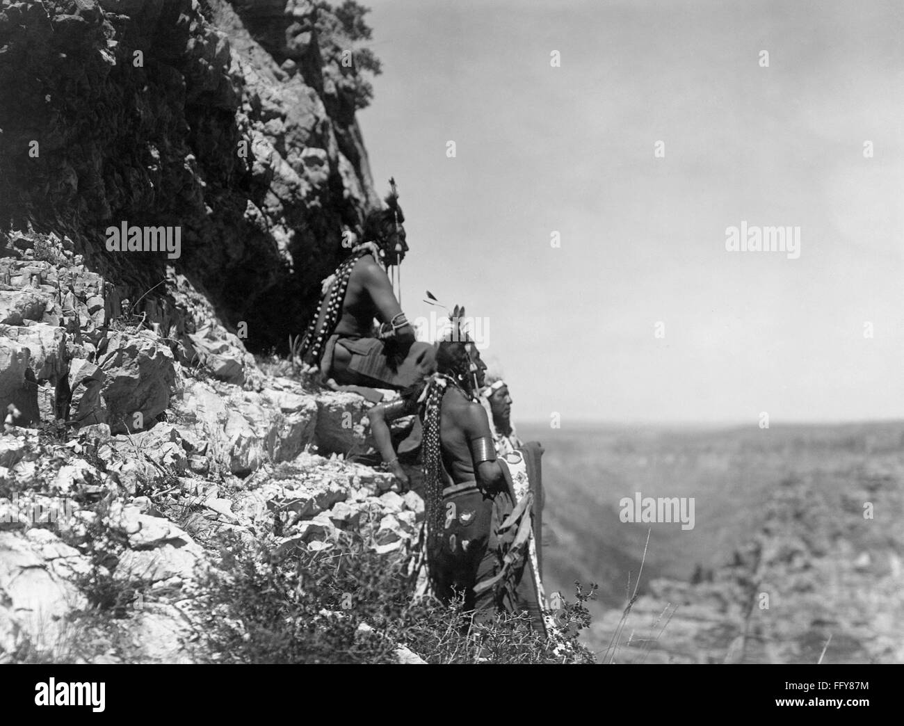 CURTIS: CROW MEN, c1905. /nThree Crow Native Americans standing on the ...
