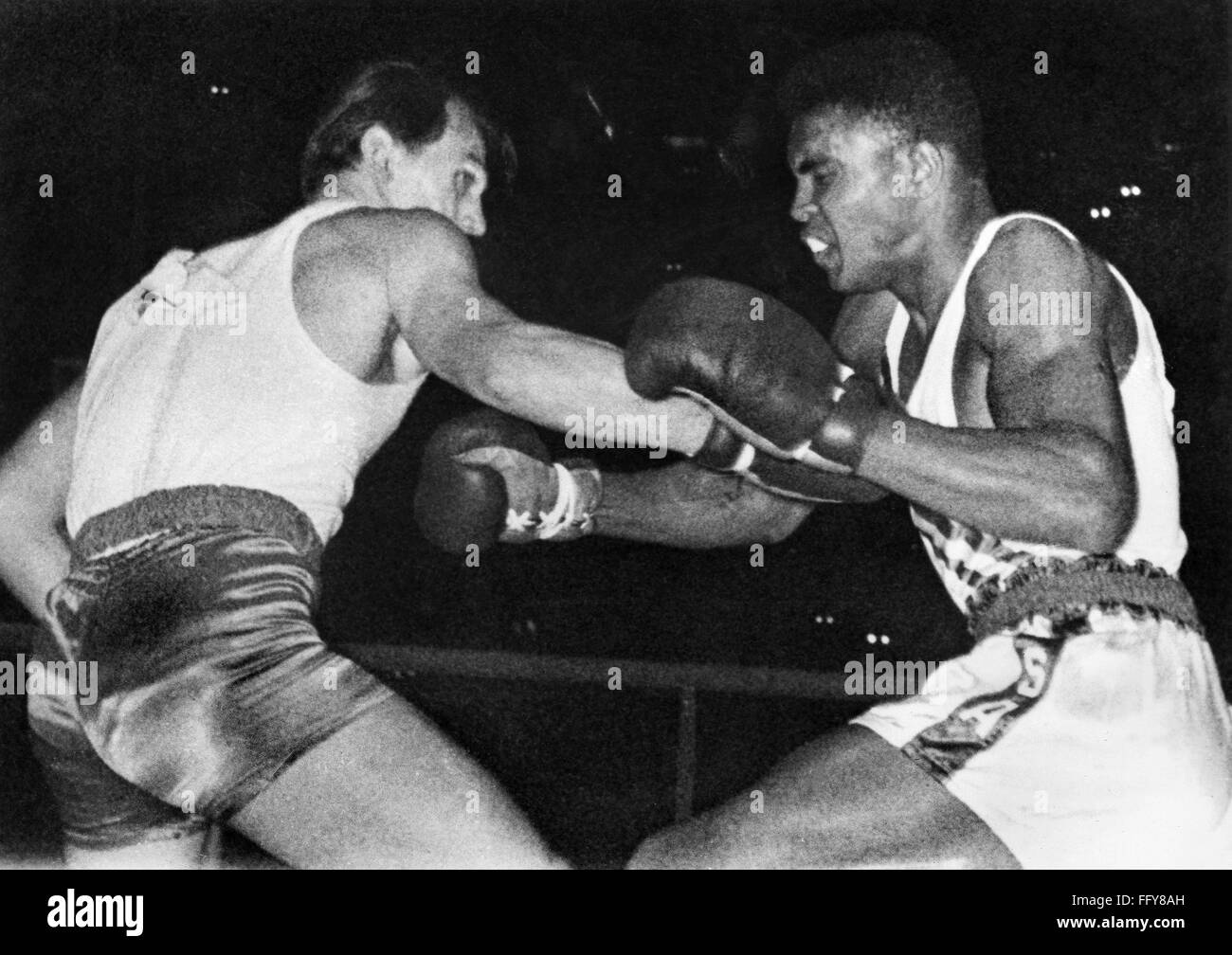 MUHAMMAD ALI (1942- ). /nNΘ Cassius Clay. Ali (right) in a fight ...