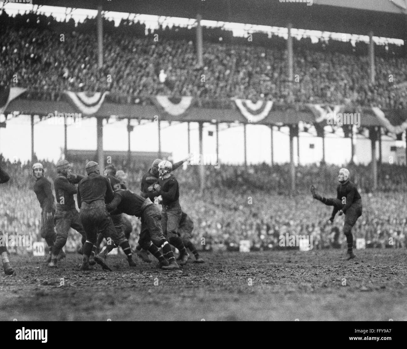 FOOTBALL GAME, 1925. /nPhil White of the New York Giants kicking the ...