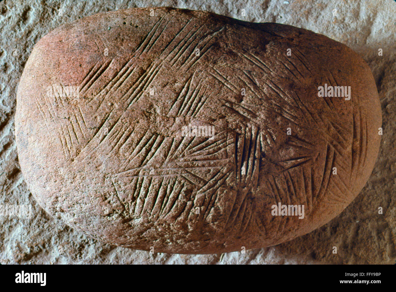 CAVE ART: INCISED ROCK. /nGneiss pebble with incised pattern from ...