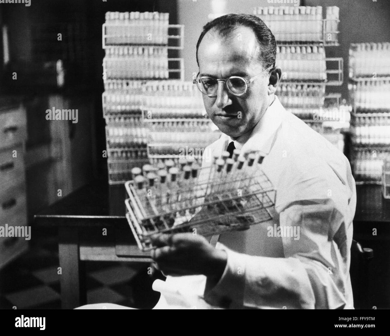 JONAS EDWARD SALK /n(1914-1995). American microbiologist. Salk in his ...