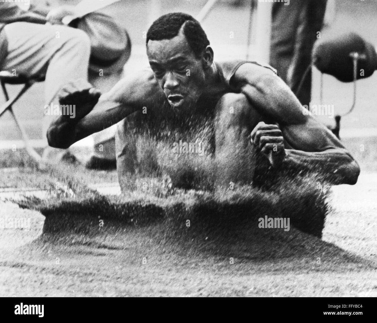 ROBERT BEAMON (1946- ). /nAmerican athlete. Beamon competing in and ...
