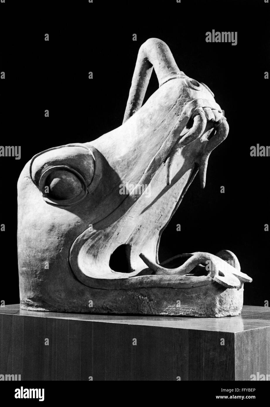MEXICO: SERPENT HEAD. /nGiant clay figure of a serpent's head, from ...