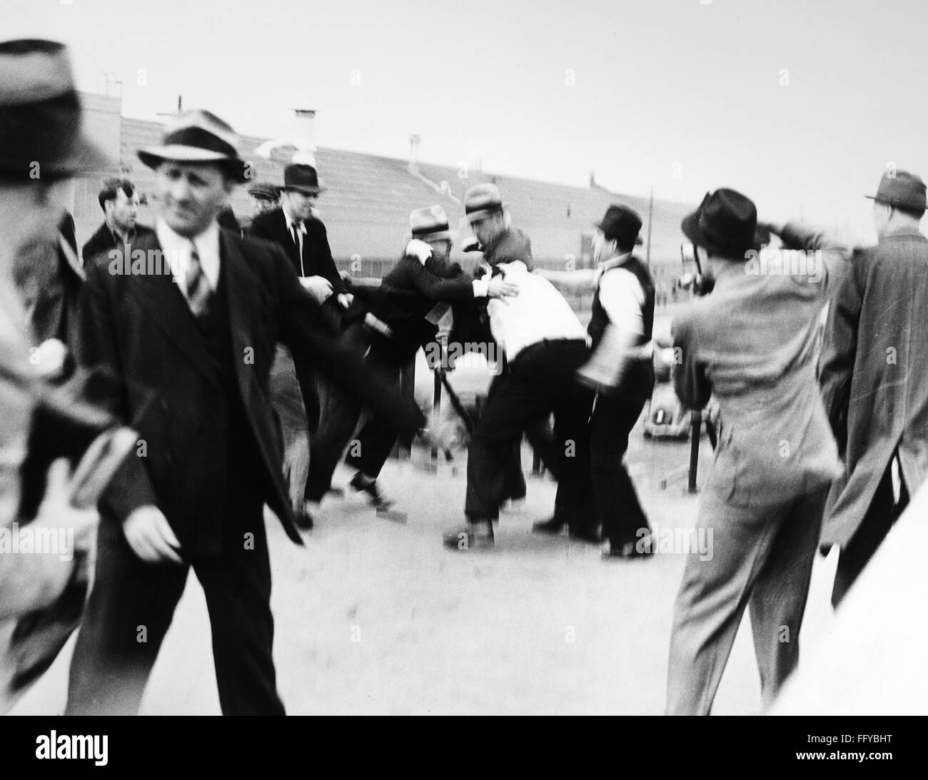 UNION ORGANIZING, 1937. /nAs newspaper photographers snap pictures ...