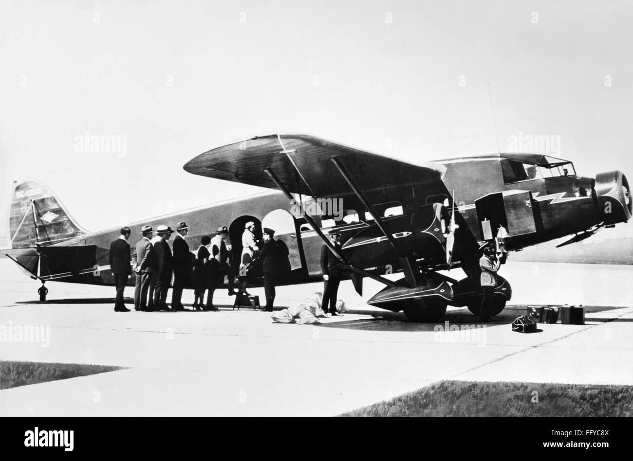 STINSON AIRPLANE, 1932. /nPassengers boarding a Stinson Model U ...
