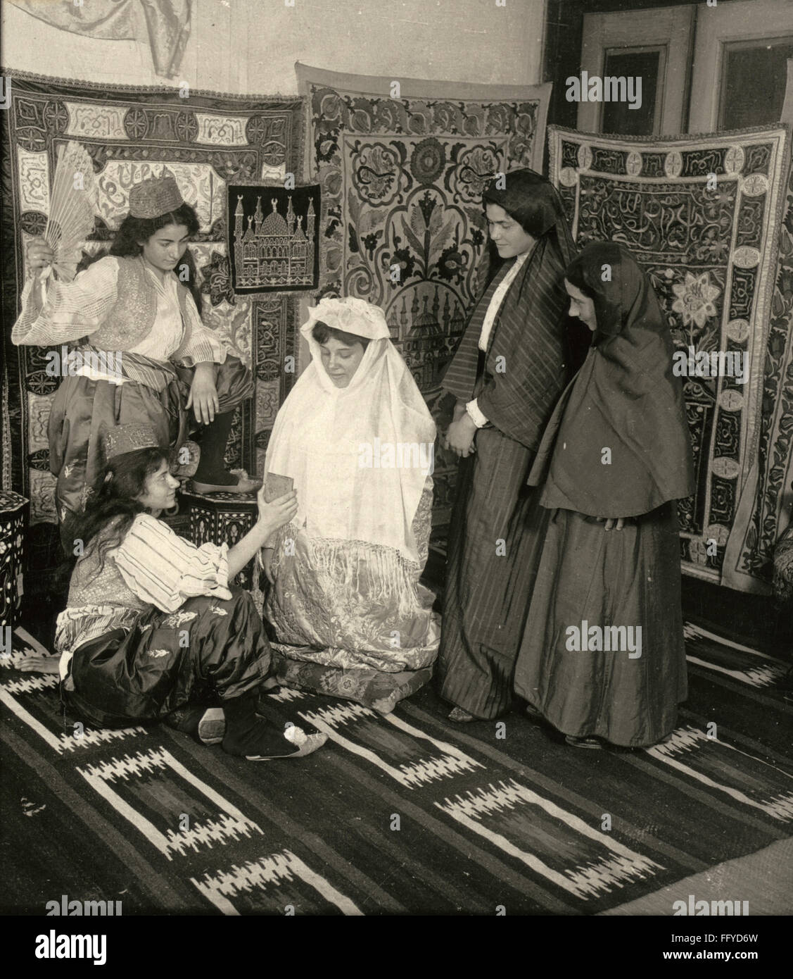 TURKEY: BRIDE, 1914./nA Turkish bride in her wedding dress surrounded ...