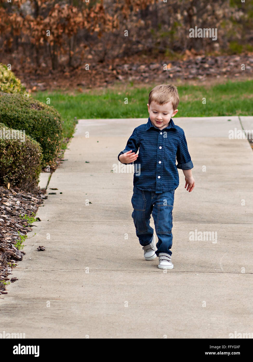 Boys walking in park hi-res stock photography and images - Alamy
