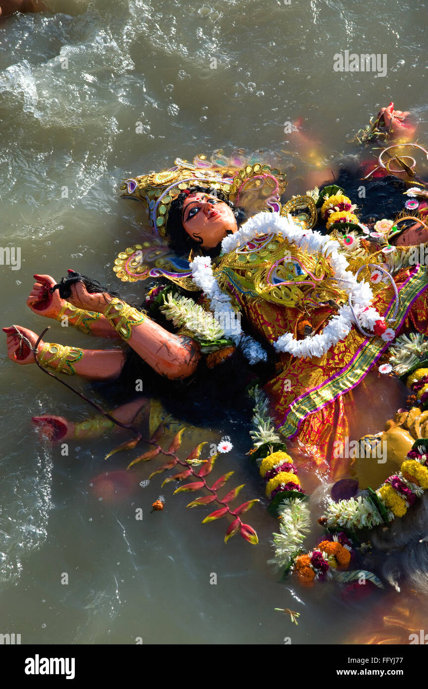 Floating idol of goddess durga in river on durga puja festival ; Howrah ...