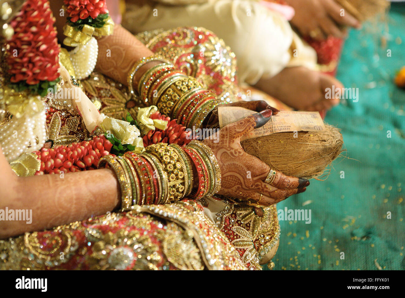 Indian ceremony bride coconut hi-res stock photography and images - Alamy