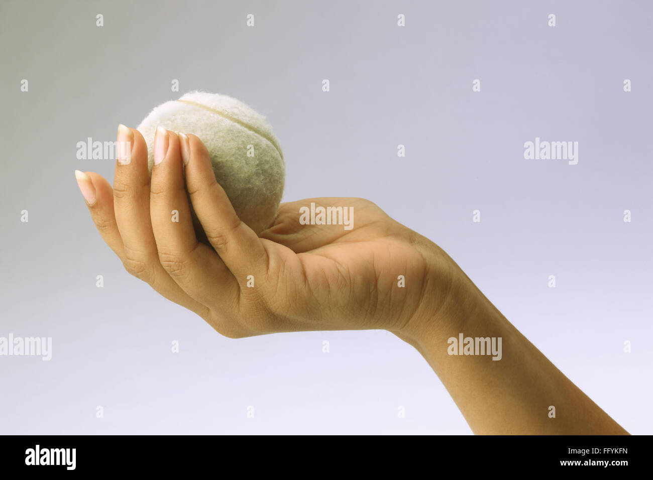 ball in hand India Stock Photo - Alamy