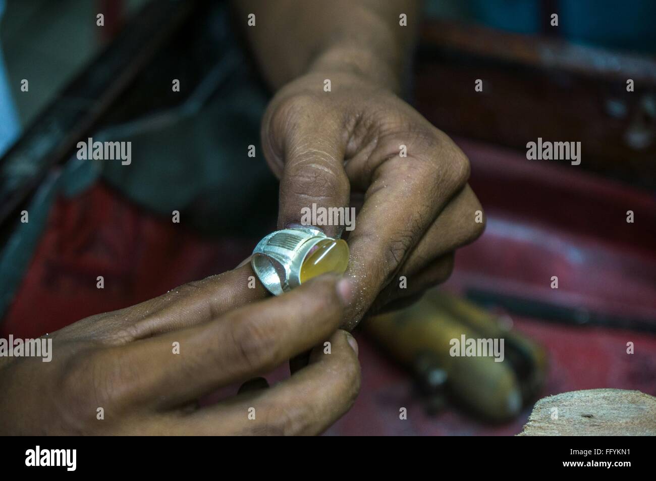 Close-Up Of Goldsmith Hands Working On Ring Stock Photo - Alamy