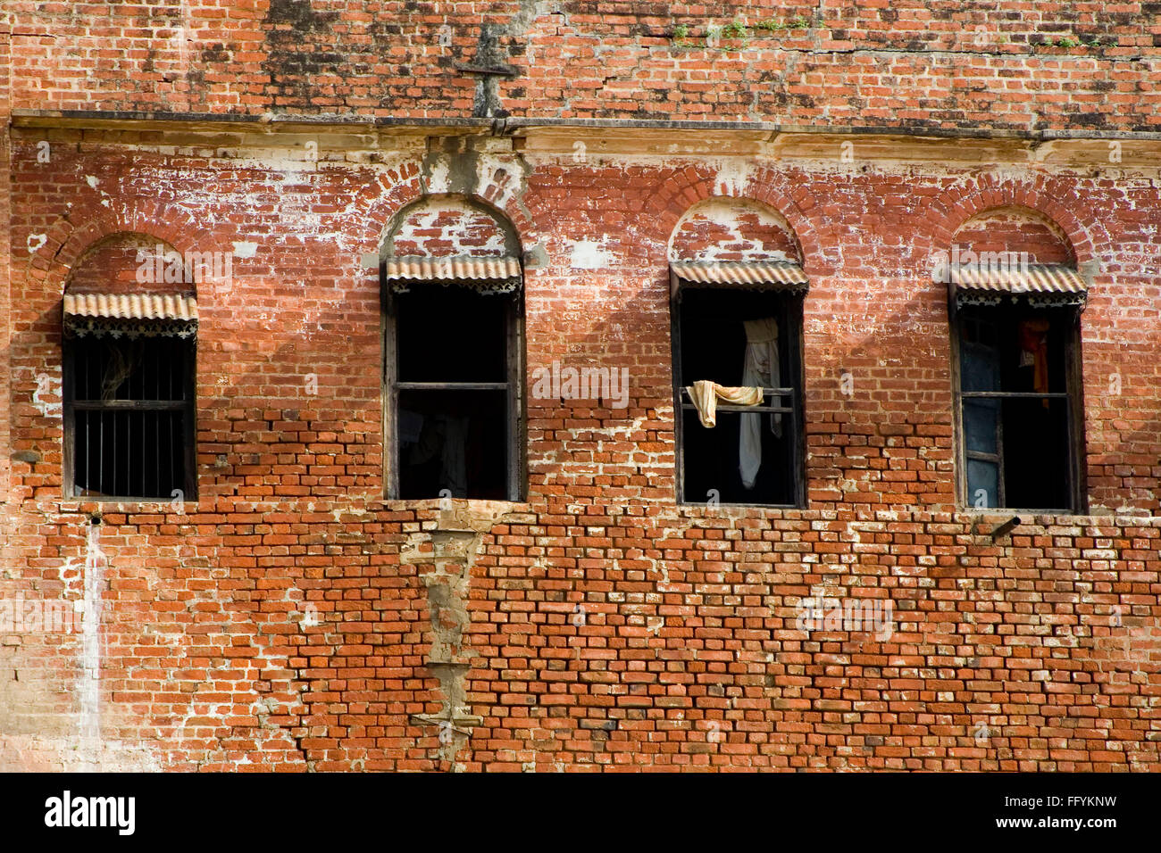 Four window in brick Stock Photo - Alamy