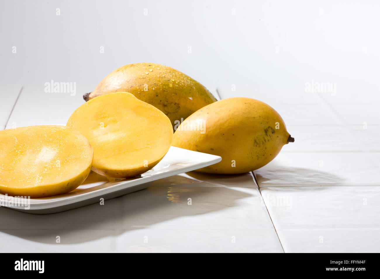 mangoes and mango slice Stock Photo - Alamy