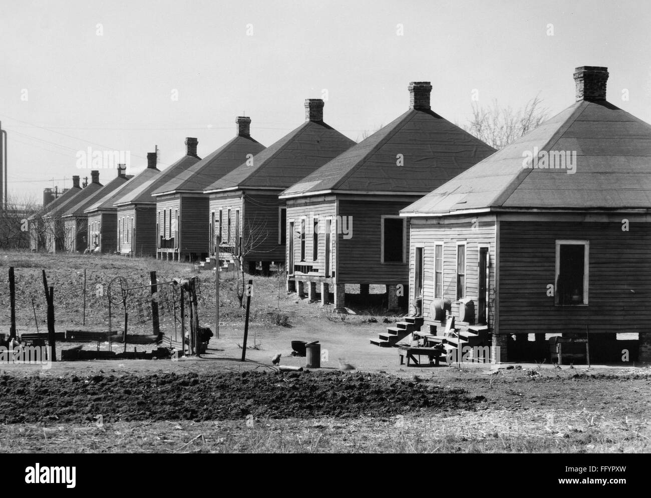 ALABAMA: HOUSING, 1936. /nSteelmill workers' company housing with ...