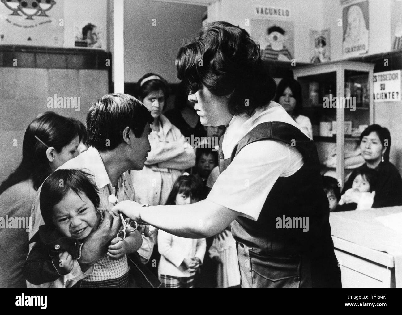 MEXICO: VACCINATION, c1980. /nA young child receiving a vaccination in ...