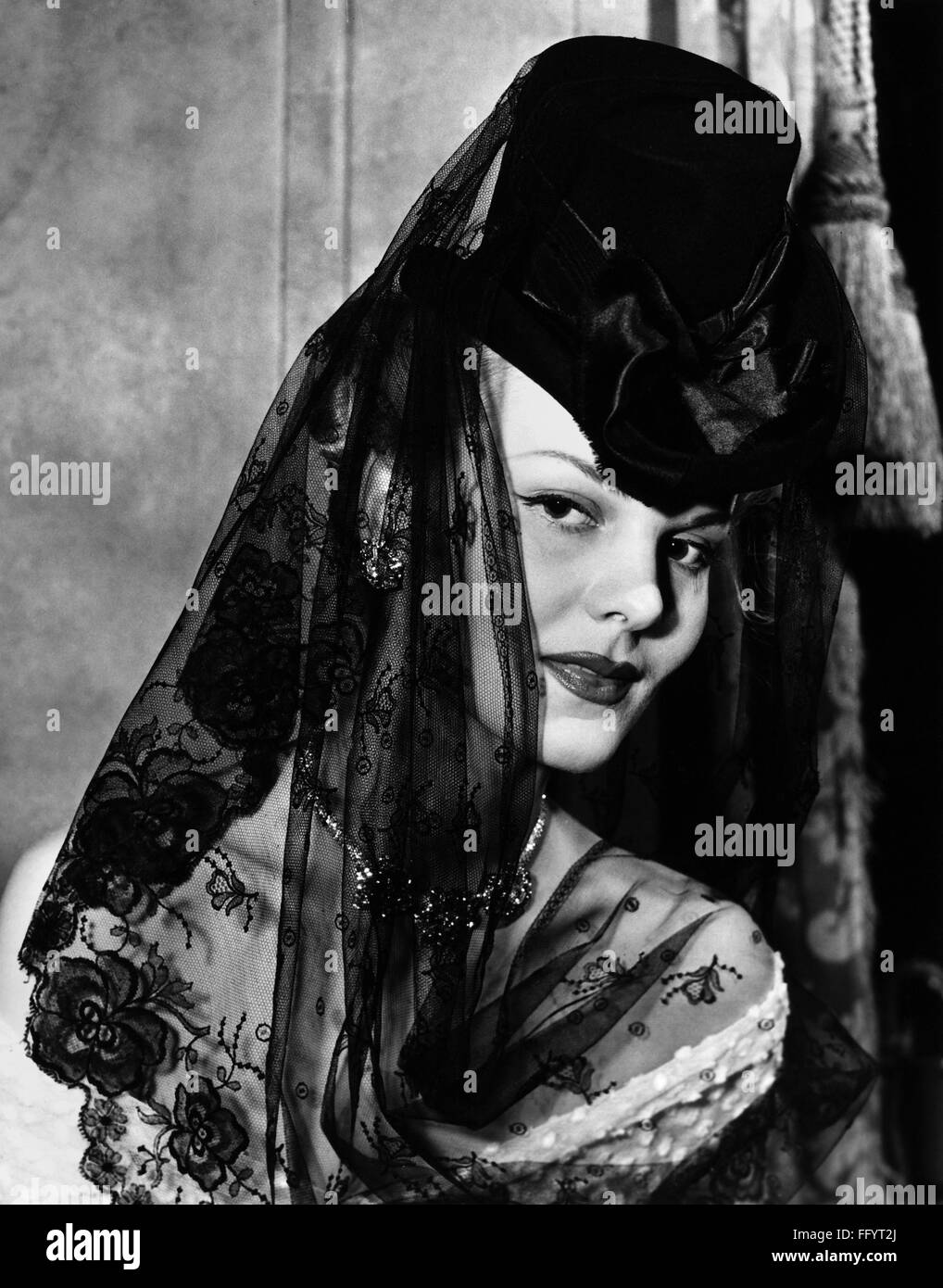 FASHION: HAT, c1943. /nWoman modelling a hat designed by Walter Florell ...