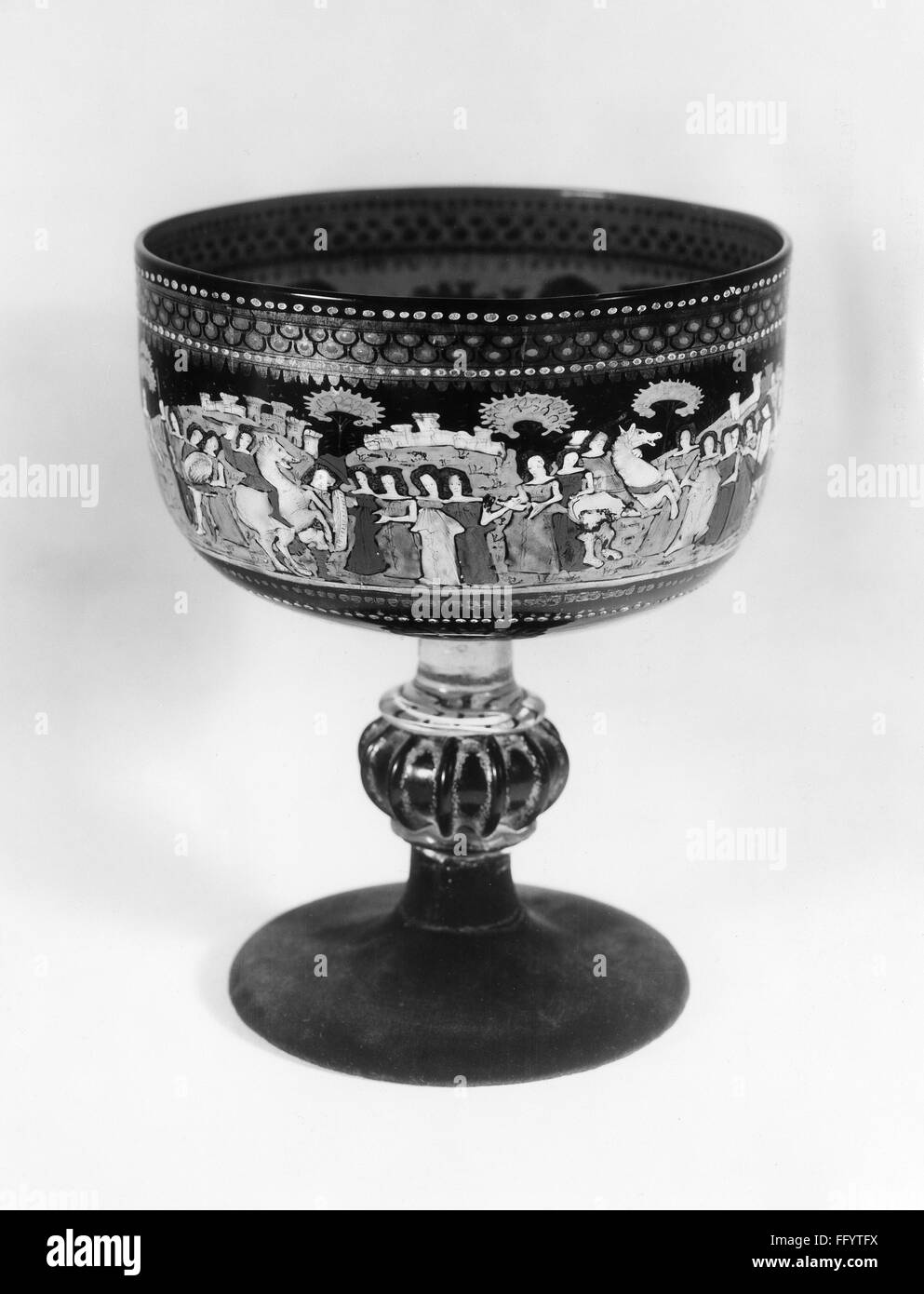 GOBLET, 15th CENTURY. /nEnameled glass goblet with figures and horses ...