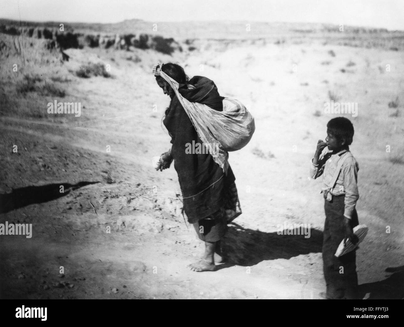 HOPI FARMER, c1900. /nA Hopi woman sowing grain at a pueblo in ...