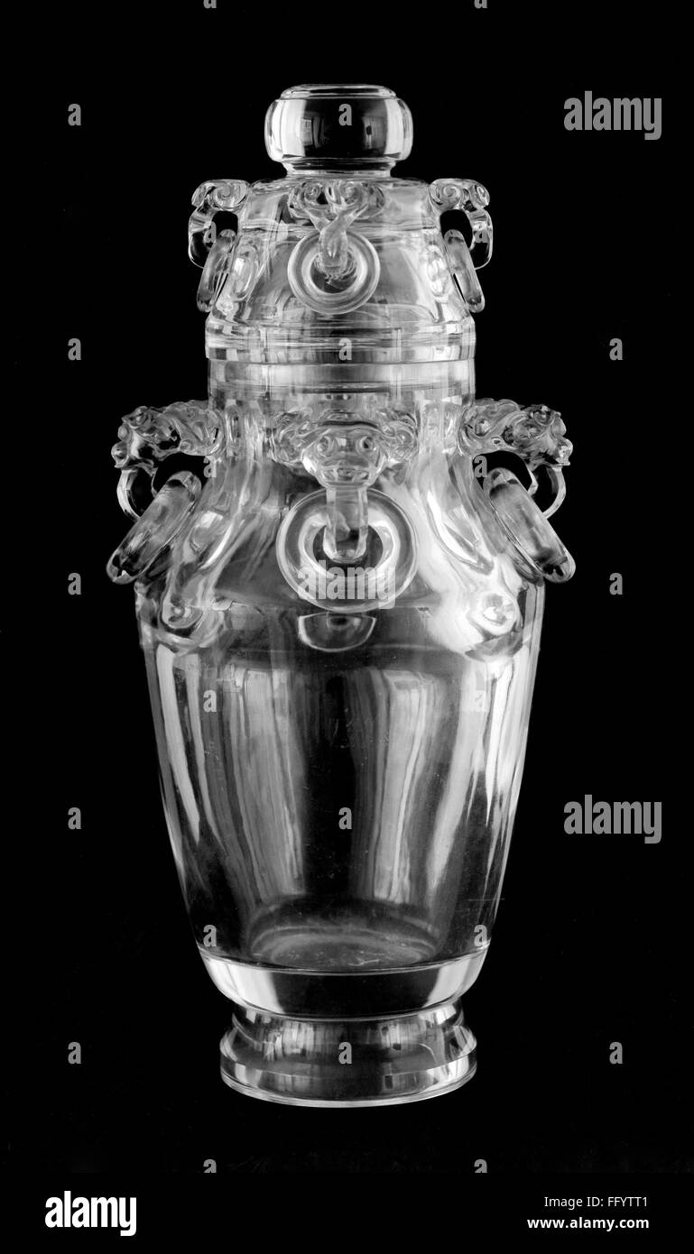 CHINA: CRYSTAL VASE. /nCarved rock crystal baluster vase with ogre-mask ...