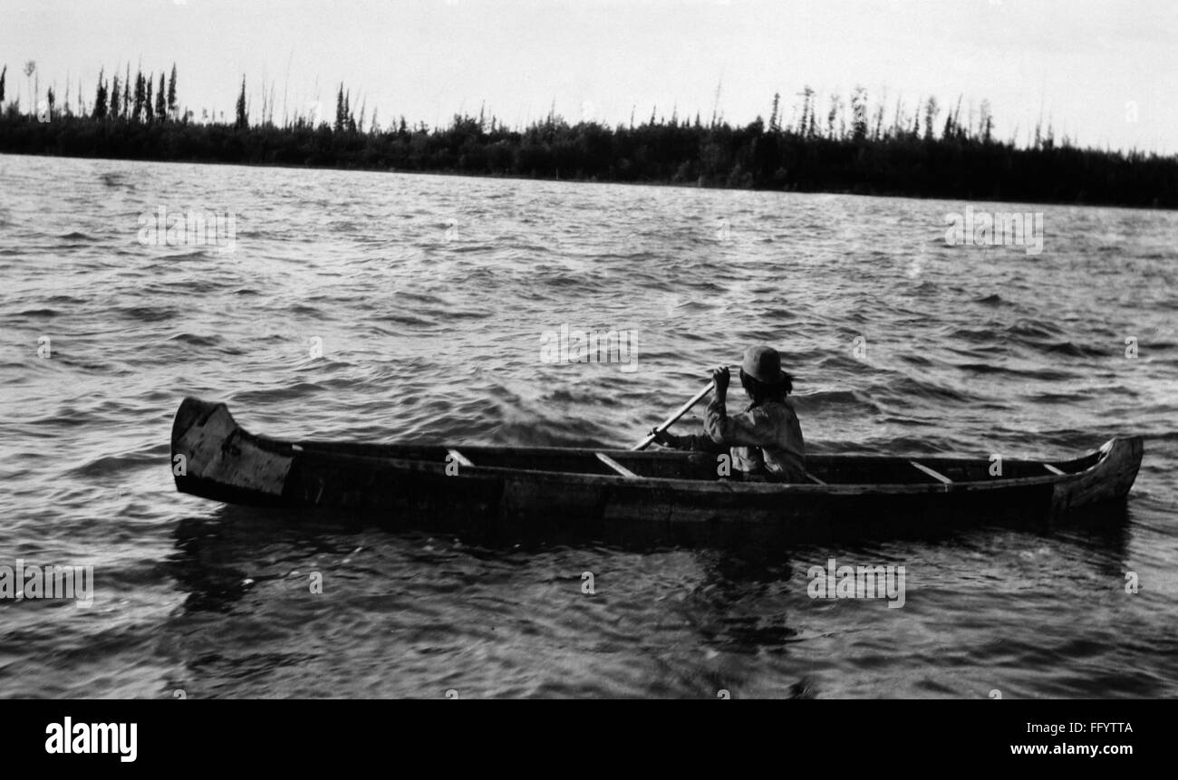 CANADA: BIRCHBARK CANOE. /nA Slavey Native American man paddling a ...