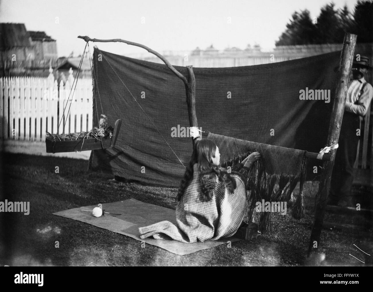 KWAKIUTL WEAVER, c1894. /nA Kwakiutl woman weaving a cedar mat, with a ...