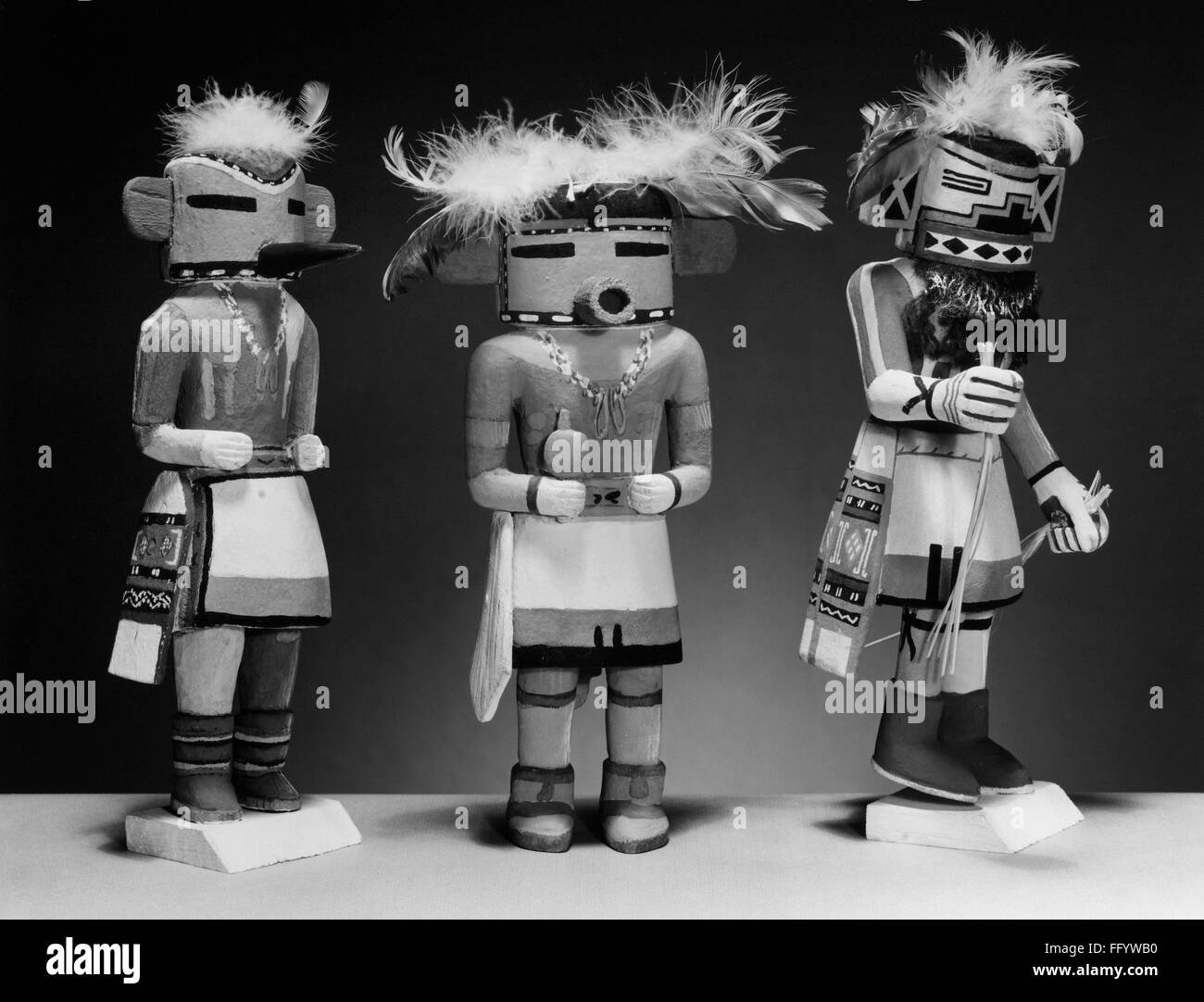 HOPI KACHINA DOLLS. /nCarved and painted wooden dolls representing Hopi ...