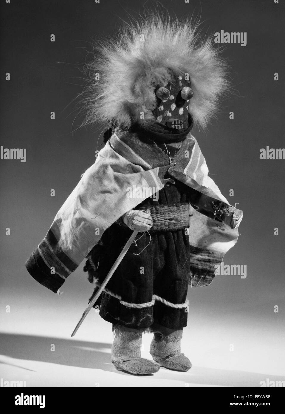 ZUNI KACHINA DOLL. /nAtashlaskja Okya, a Zuni spirit or Kachina. Carved ...