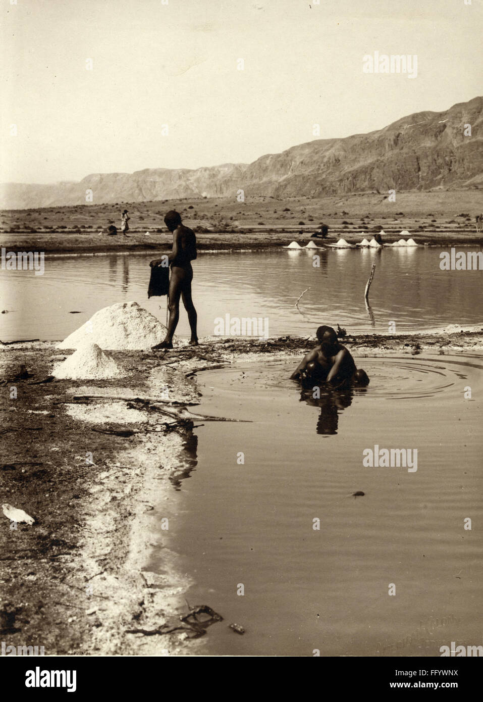 HOLY LAND: DEAD SEA. /nTwo men collecting salt from the Dead Sea ...