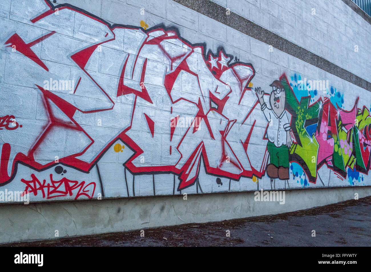 Man spray painting wall construction hi-res stock photography and ...