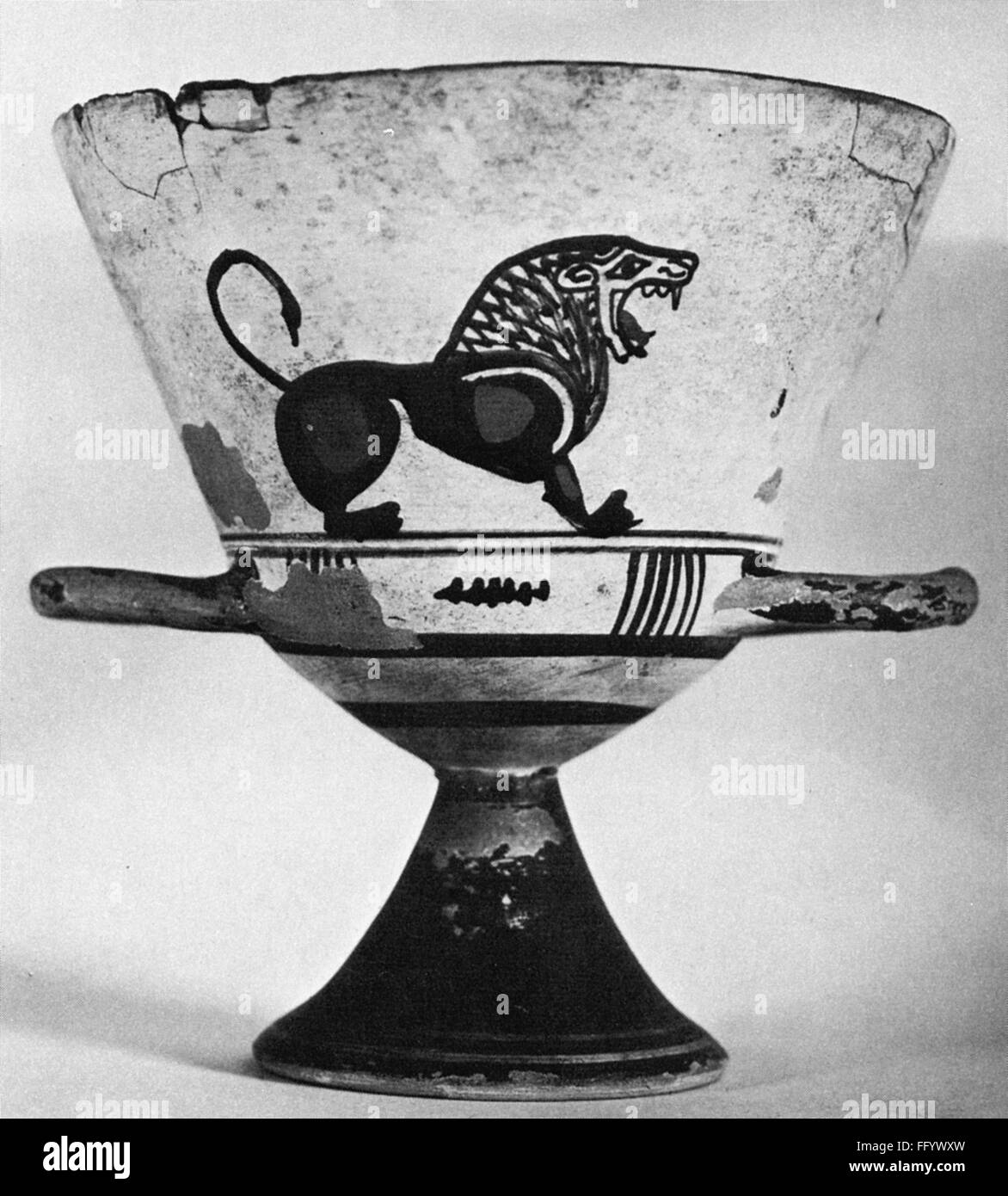 GREEK CHALICE, c570 B.C. /nTerracotta drinking vessel featuring a lion ...